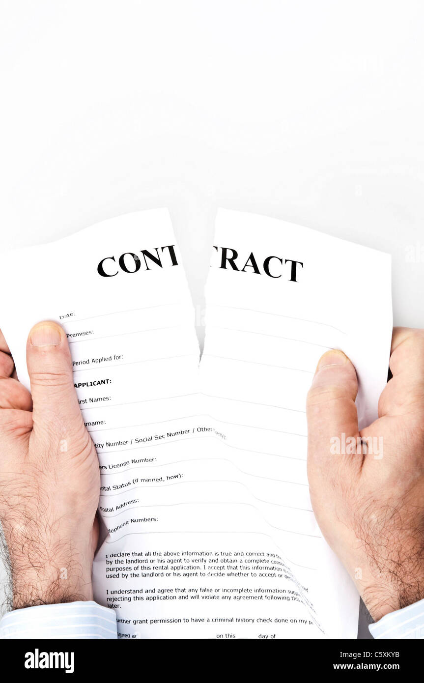 Contract termination by male hands Stock Photo - Alamy