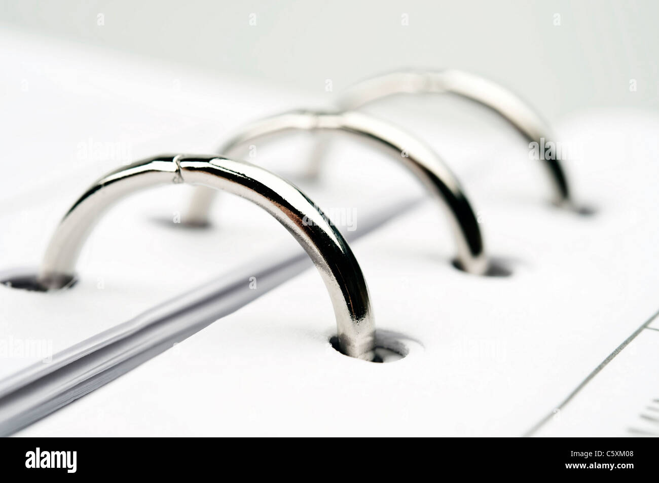 Extreme close-up to notepad clip Stock Photo - Alamy