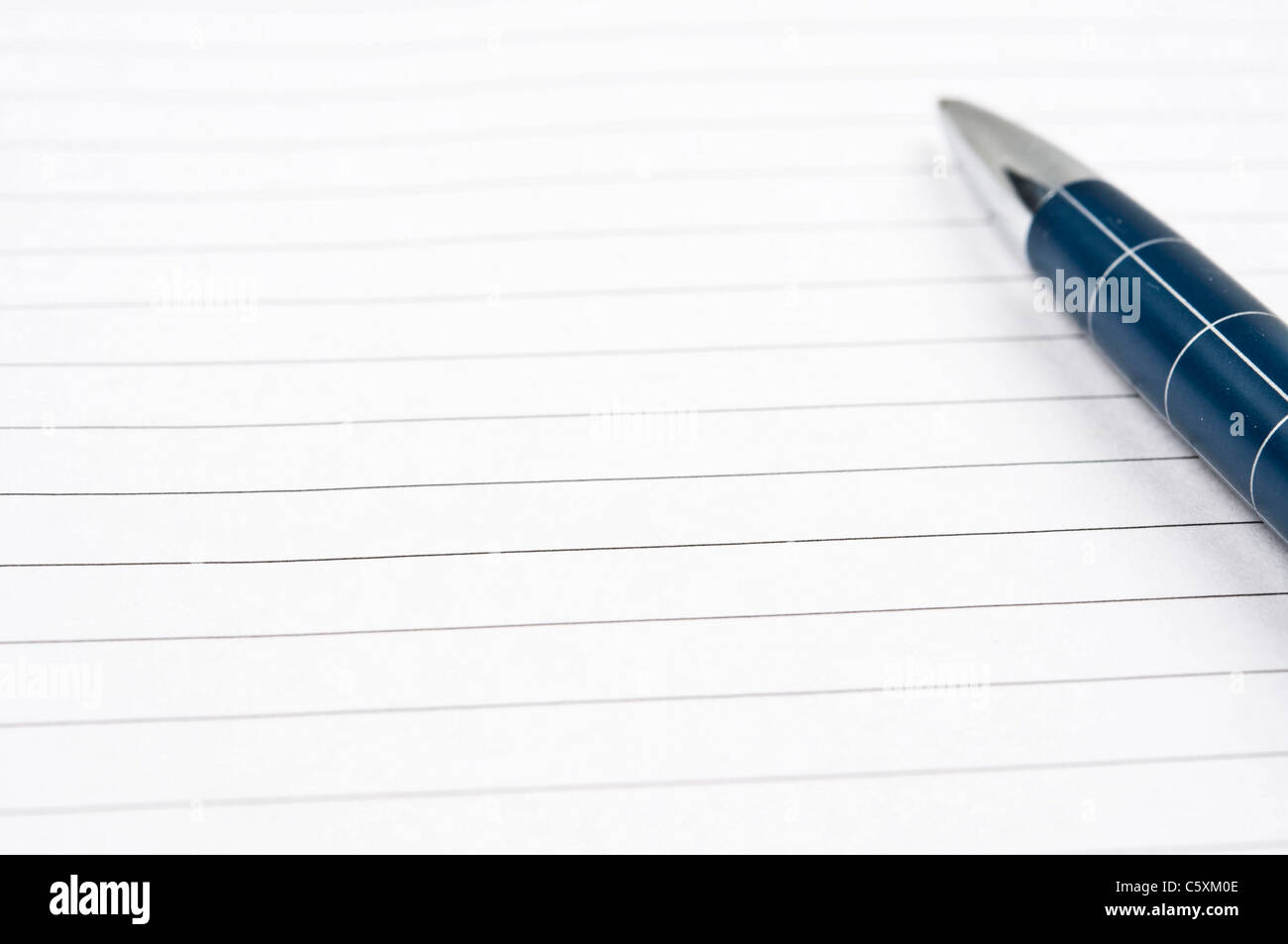 Closeup to paper and pen Stock Photo - Alamy
