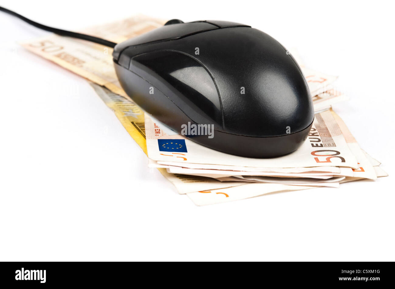Closeup to mouse on euro banknotes Stock Photo - Alamy