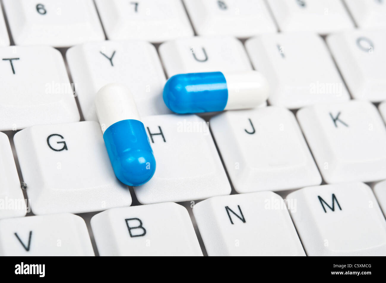 Medicine concept computer keyboard pill hi-res stock photography and ...
