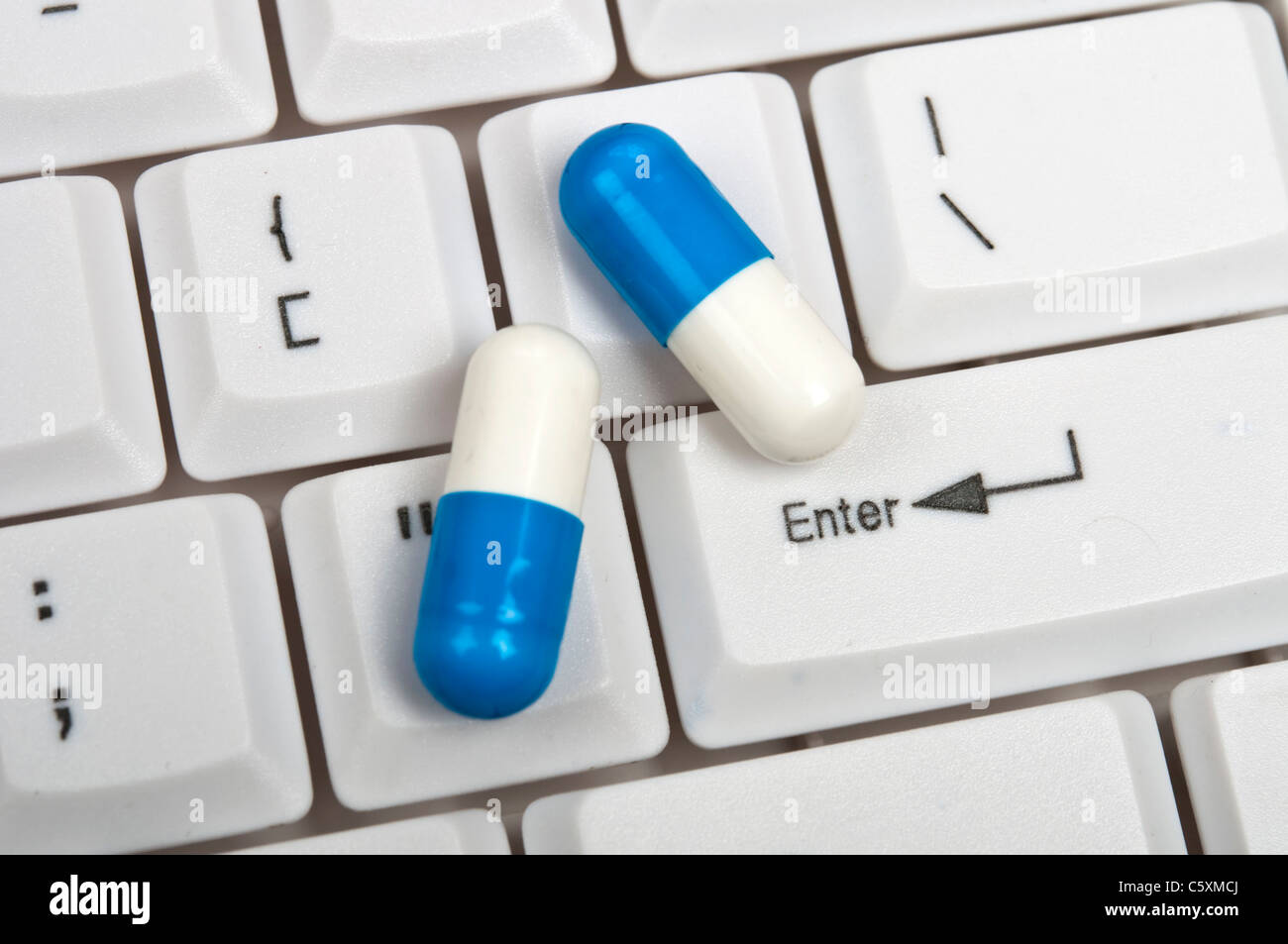 Medicine concept computer keyboard pill hi-res stock photography and ...