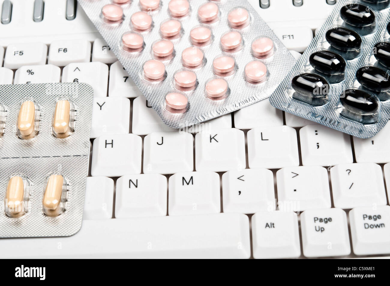 Medicine concept computer keyboard pill hi-res stock photography and ...