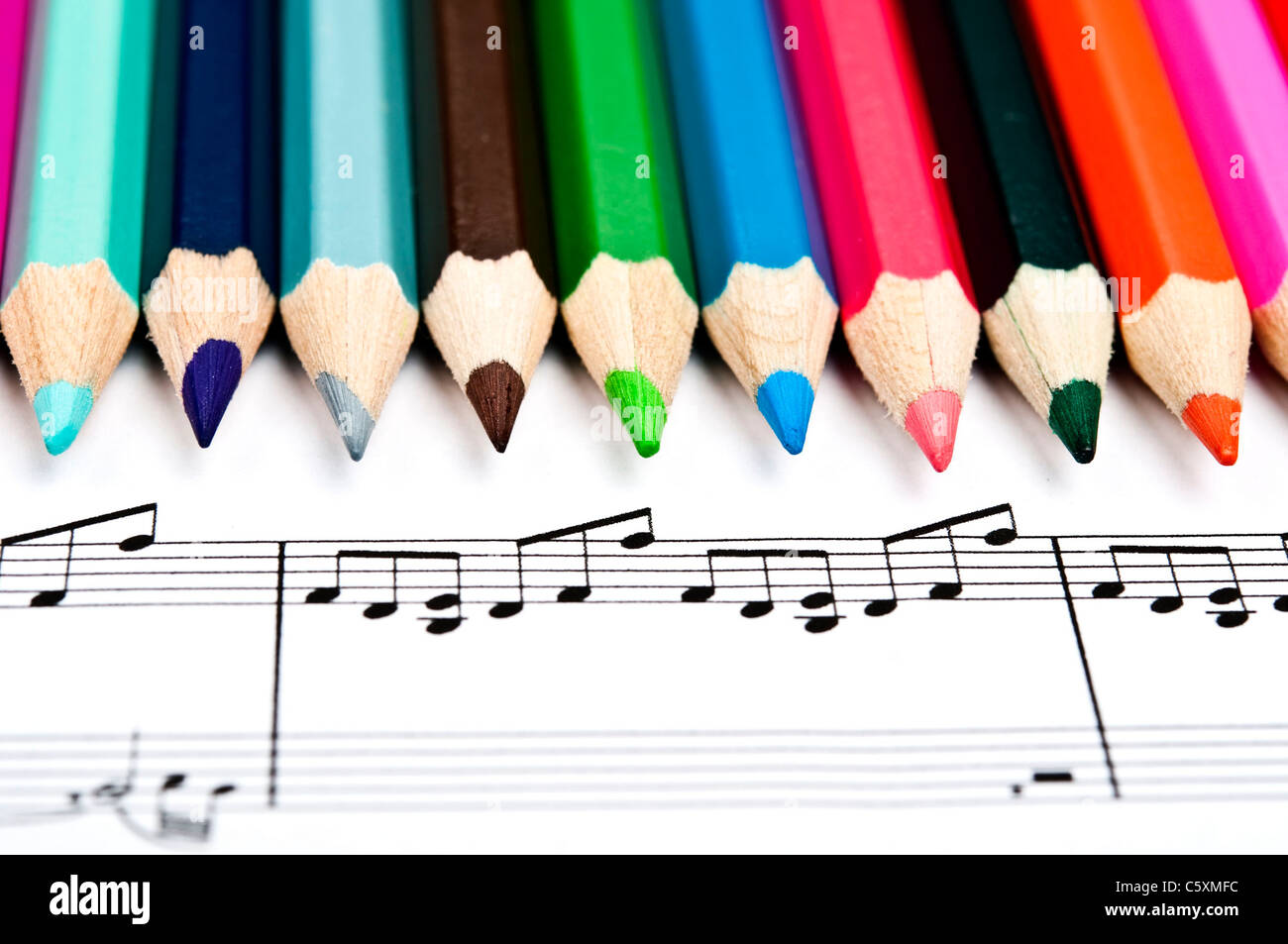 Pencils on an musical score Stock Photo - Alamy