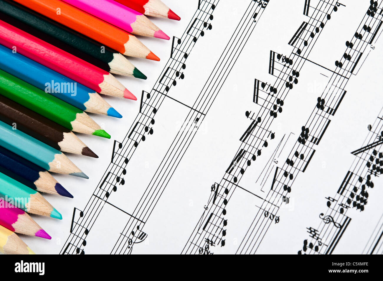 Pencils on an musical score Stock Photo - Alamy