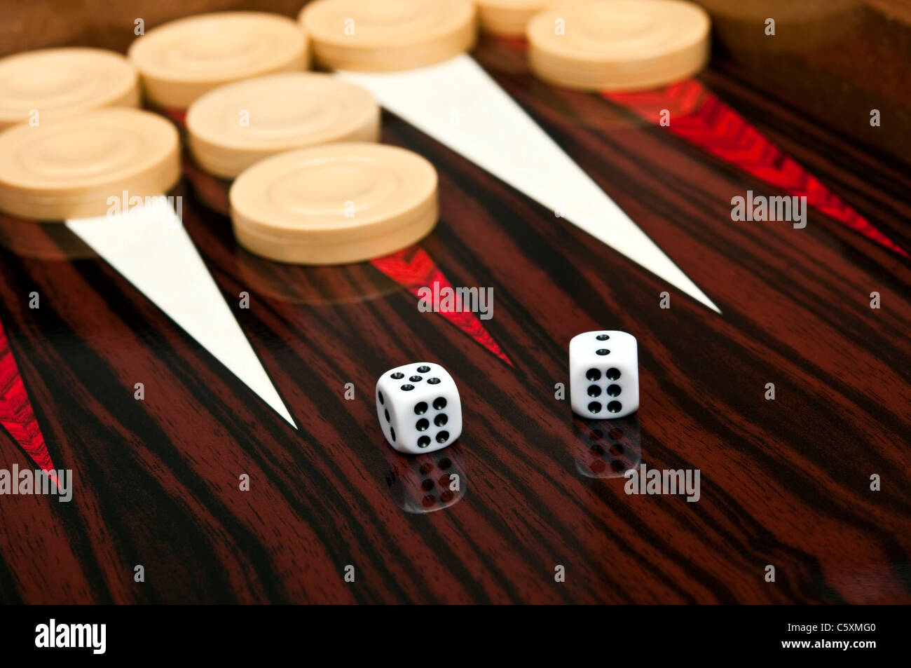 Backgammon table and dice closeup Stock Photo - Alamy