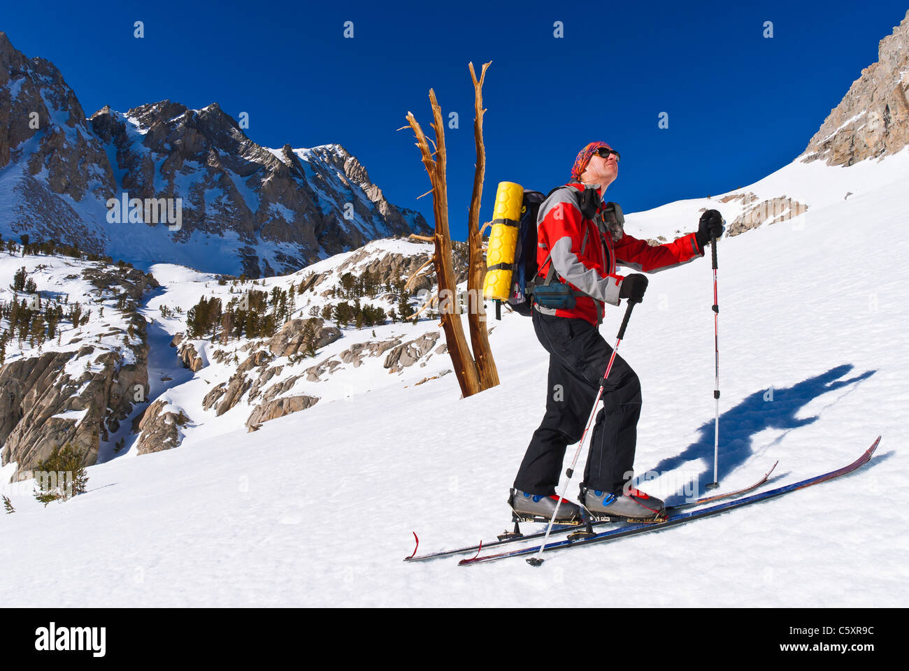 Backcountry skier climbing Piute Pass, Inyo National Forest, Sierra ...