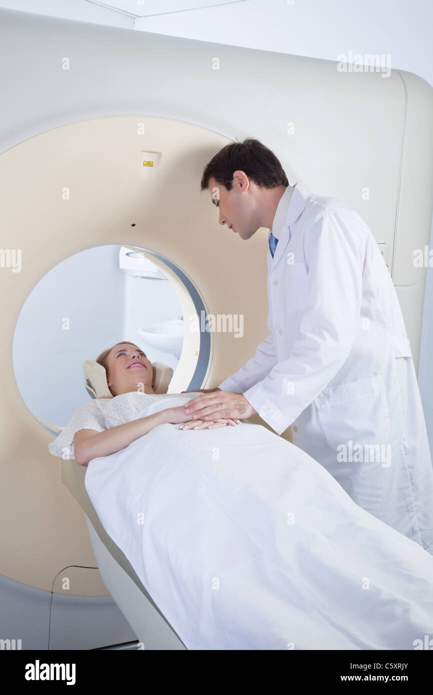 Doctor comforting patient before CT scan Stock Photo - Alamy