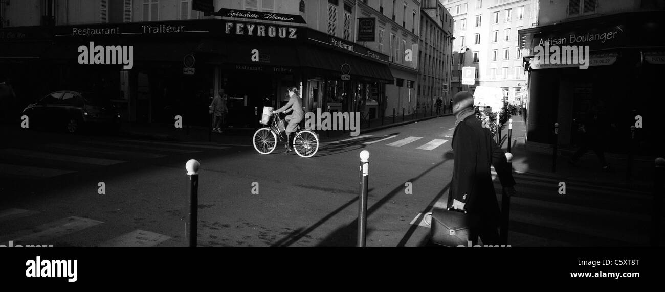 Early morning activity on the street corner of rue Juge and rue de ...
