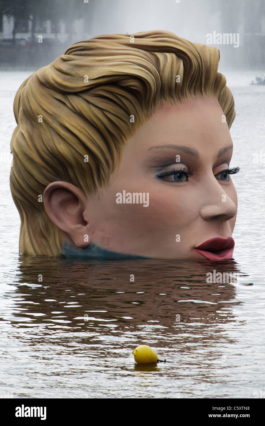 A 'mermaid' sculpture created by Oliver Voss is seen on Alster lake ...