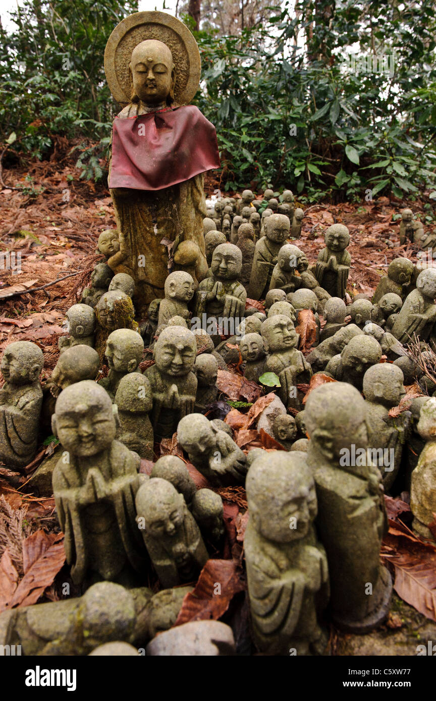People bring jizo buddhist statues to the small shrine from all over ...