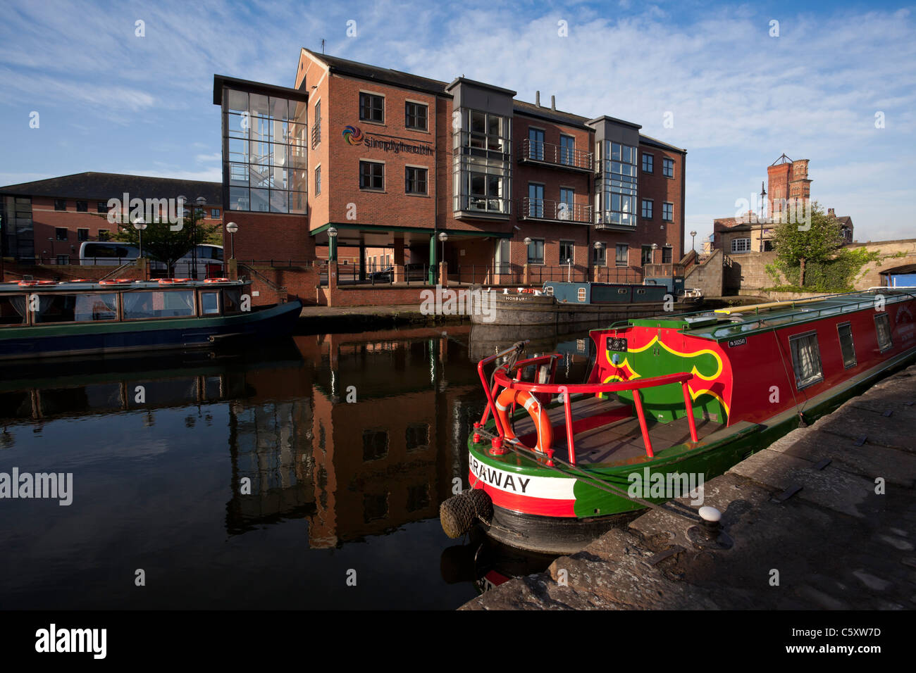 Modern buildings by The River Aire in Leeds, part of the waterfront ...