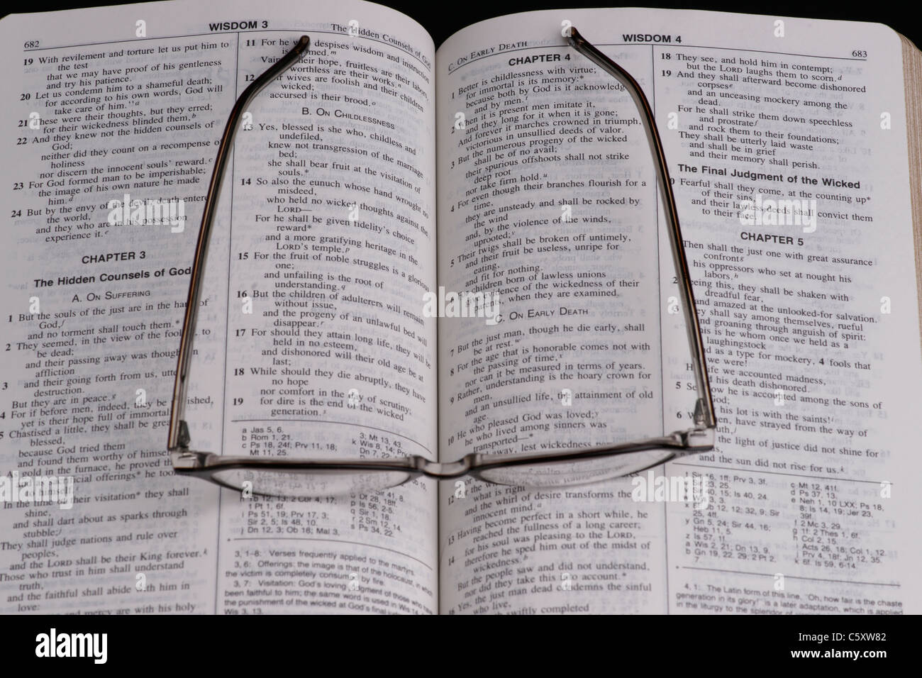 Open bible and glasses Stock Photo - Alamy