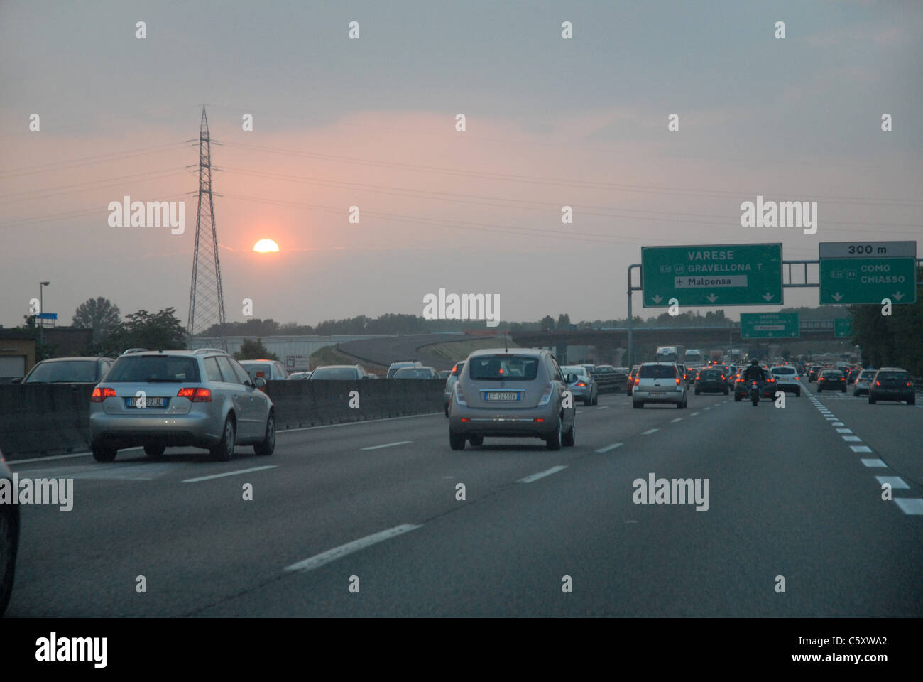 Heavy traffic moving at speed on the E62 motorway in Italy Stock Photo ...