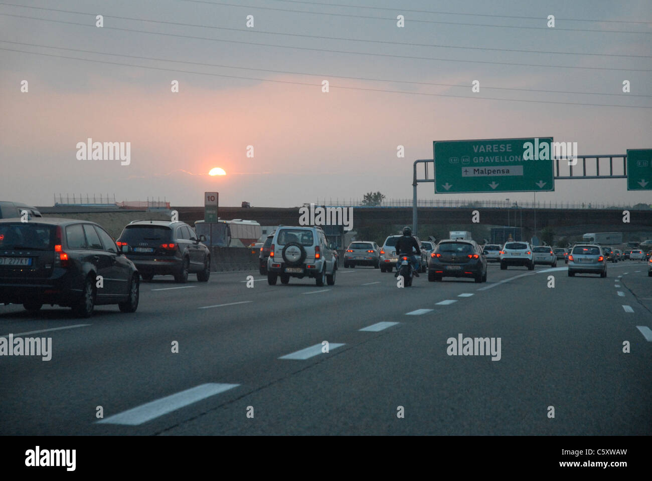 Heavy traffic moving at speed on the E62 motorway in Italy Stock Photo ...