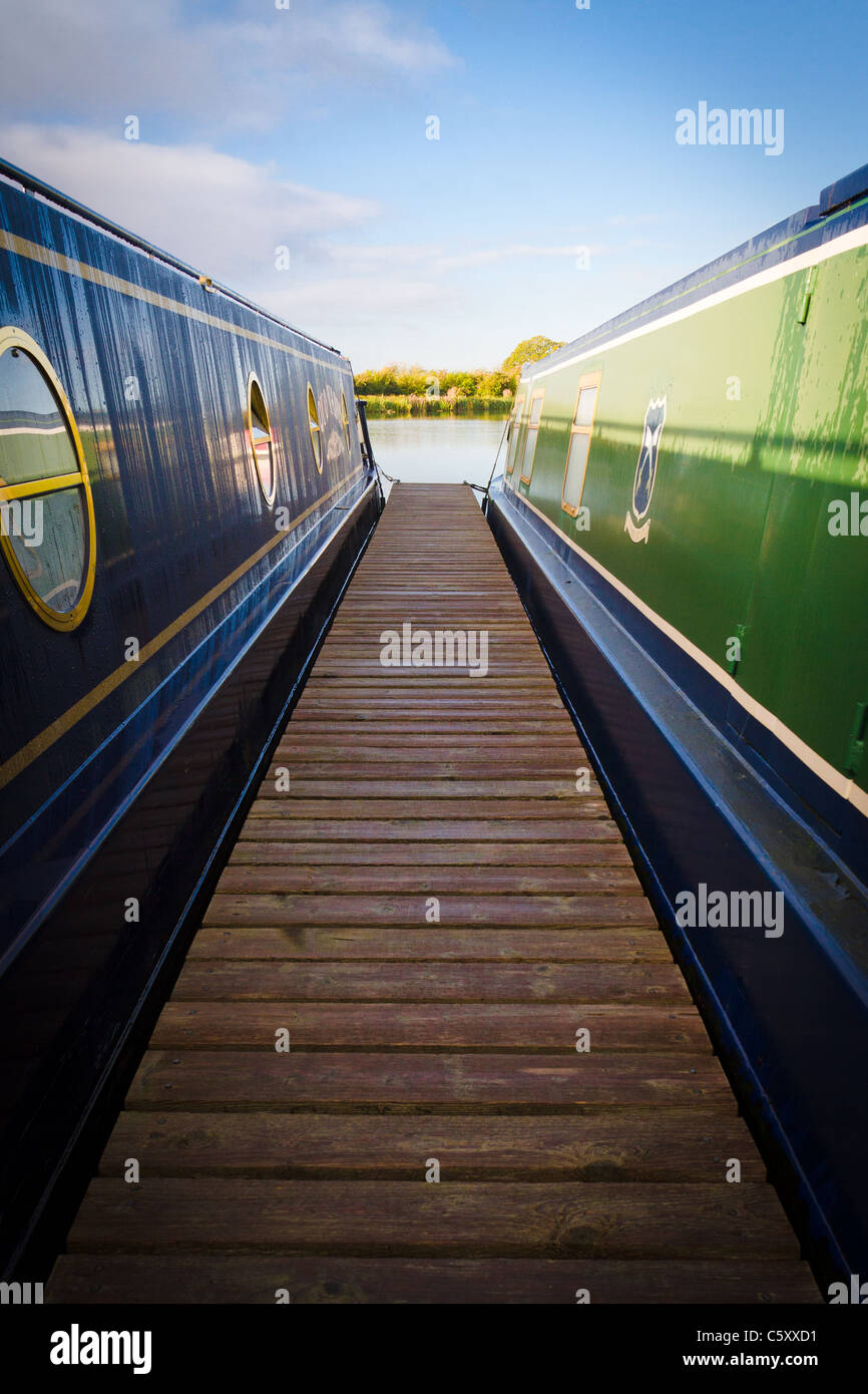 Canal boats and pontoon Stock Photo - Alamy