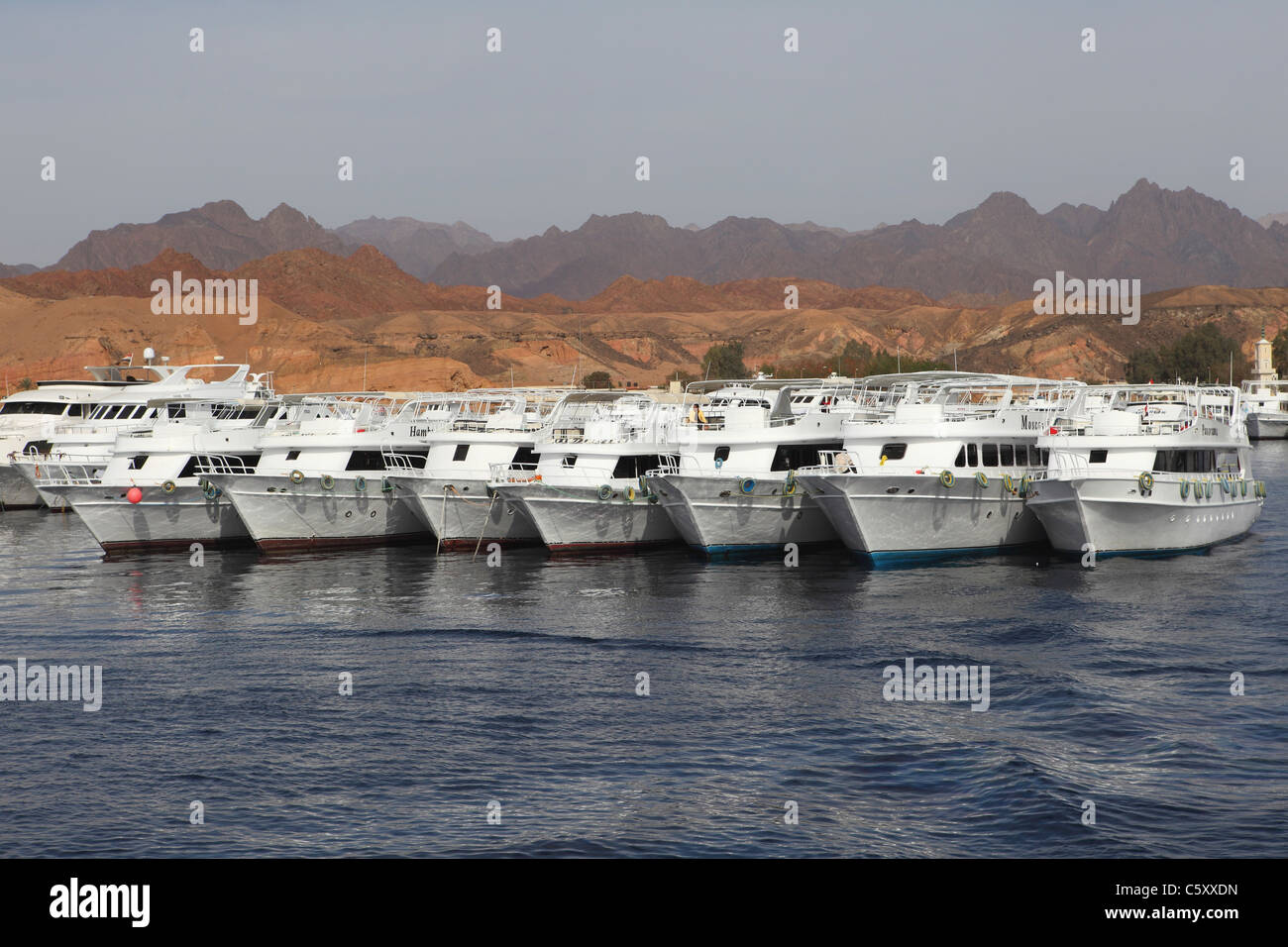 Pleasure boats in port awaiting trips out into the Red Sea at Sharm El ...