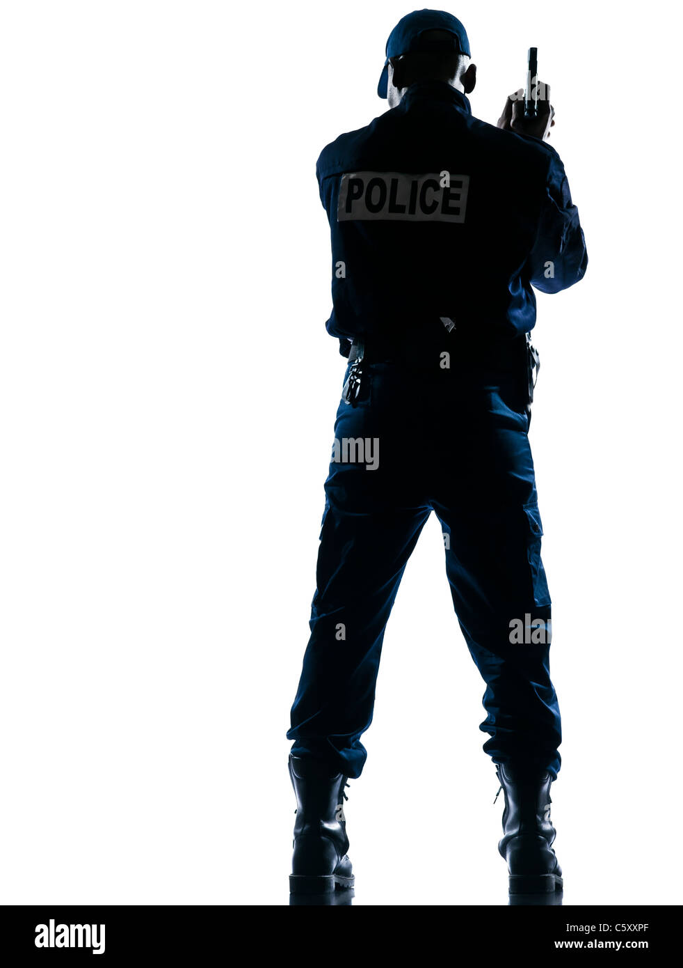 Rear view of an afro American police officer holding handgun on white ...