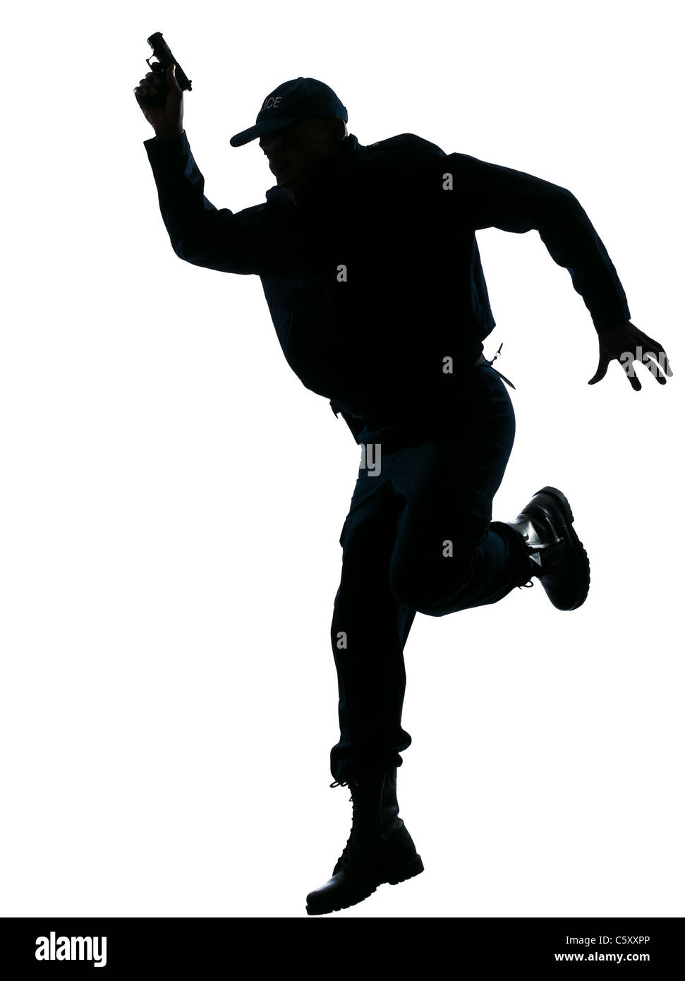 Full length of an afro American policeman running with a handgun on ...