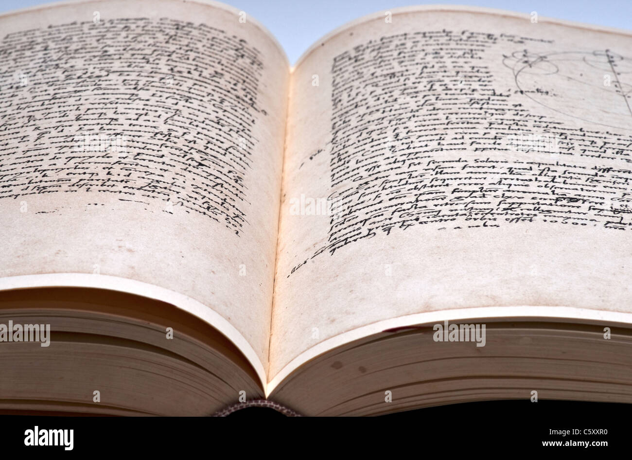 Hand written double-page spread of tattered book Stock Photo - Alamy