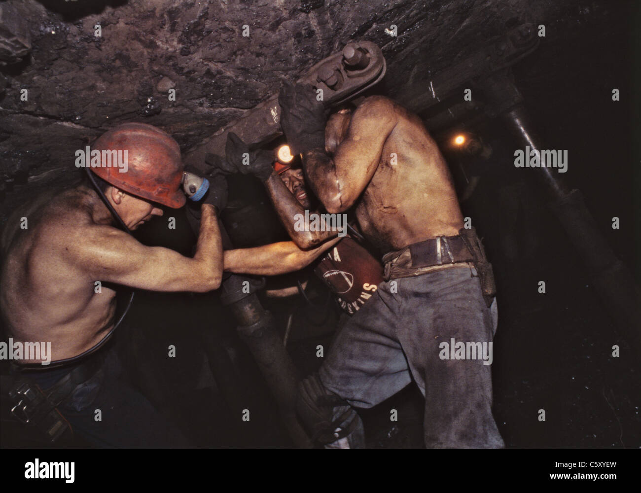 Coal miners working underground Chile Stock Photo - Alamy
