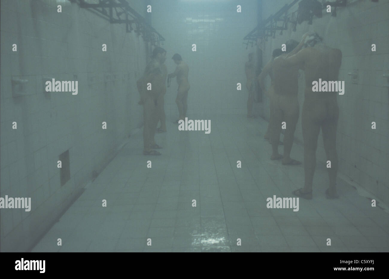 Coal miners taken a shower after work at Lota mine Stock Photo - Alamy