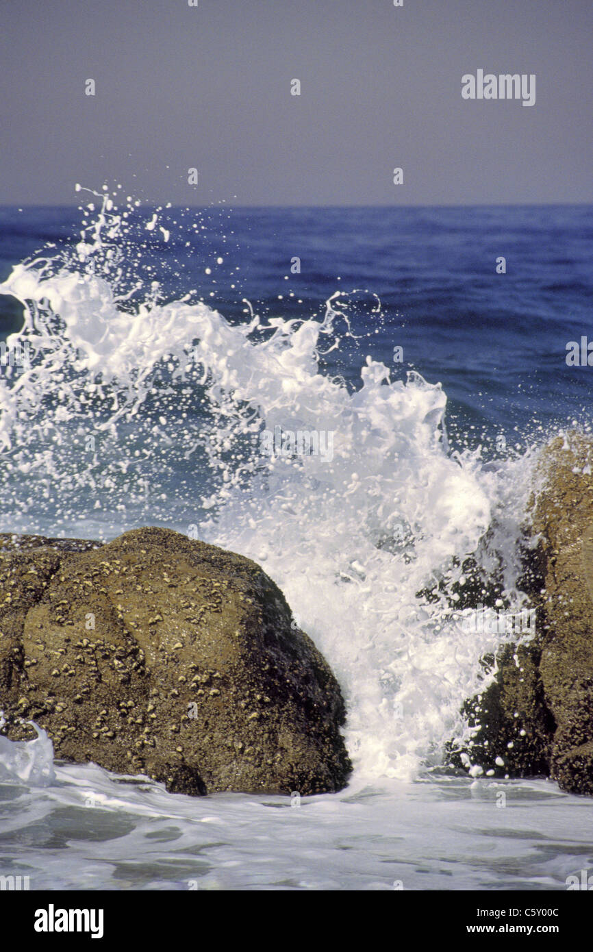 Sea spray over Rocks Stock Photo - Alamy