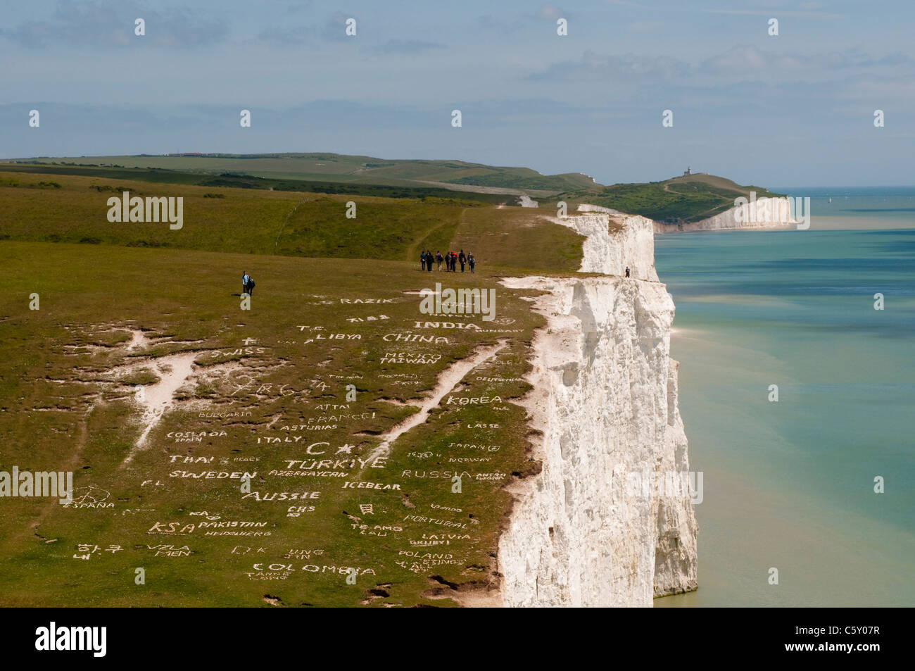 Chalk cliffs of the Seven Sisters with names of different countries ...