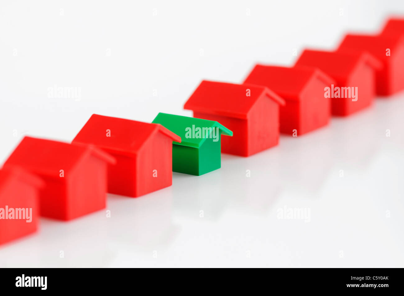 Row of model houses. Conceptual real estate image Stock Photo - Alamy