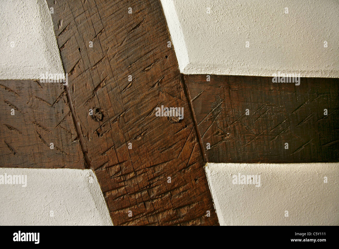 Old hand-sawn timber beams in medieval timber framed house Stock Photo ...