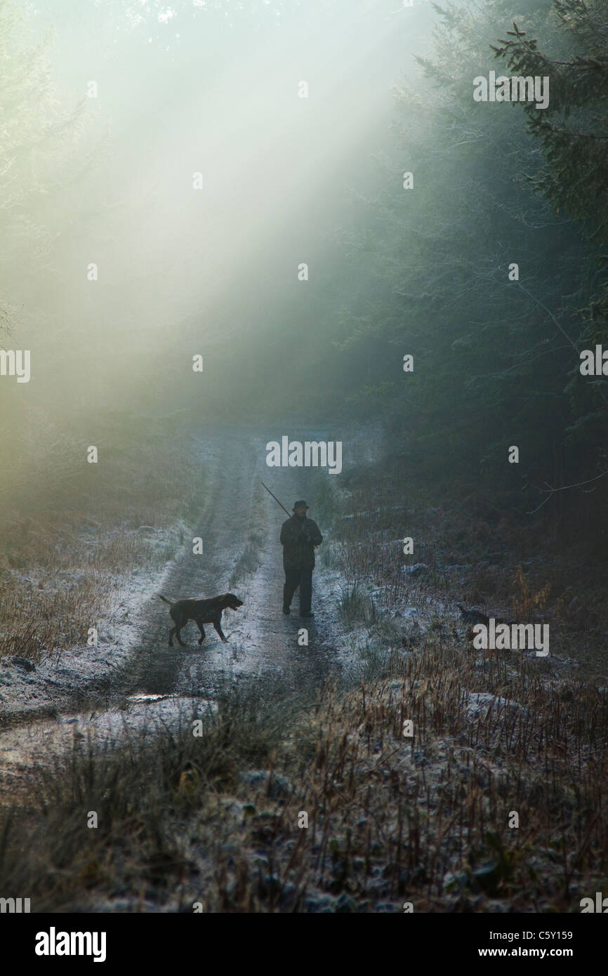 Man and animals Stock Photo - Alamy