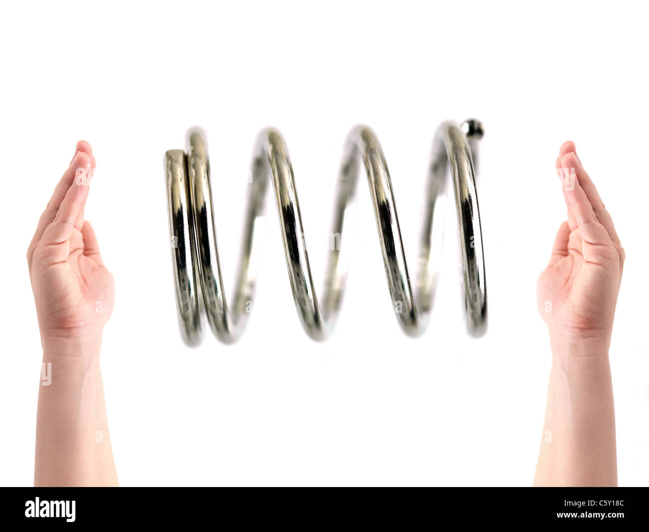 A spring isolated against a white background Stock Photo - Alamy