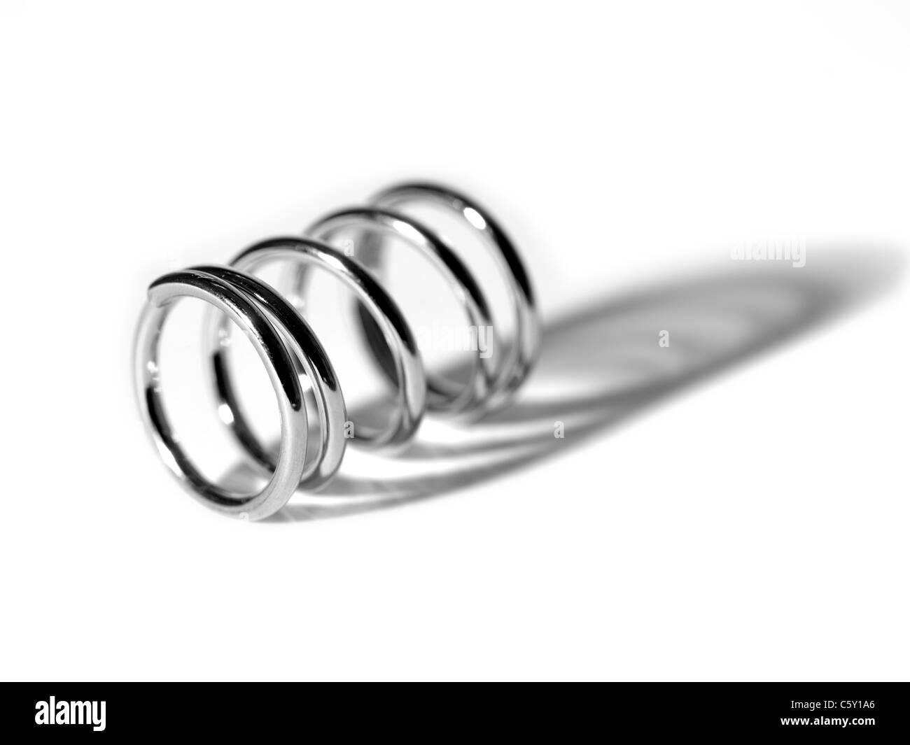 A spring isolated against a white background Stock Photo - Alamy