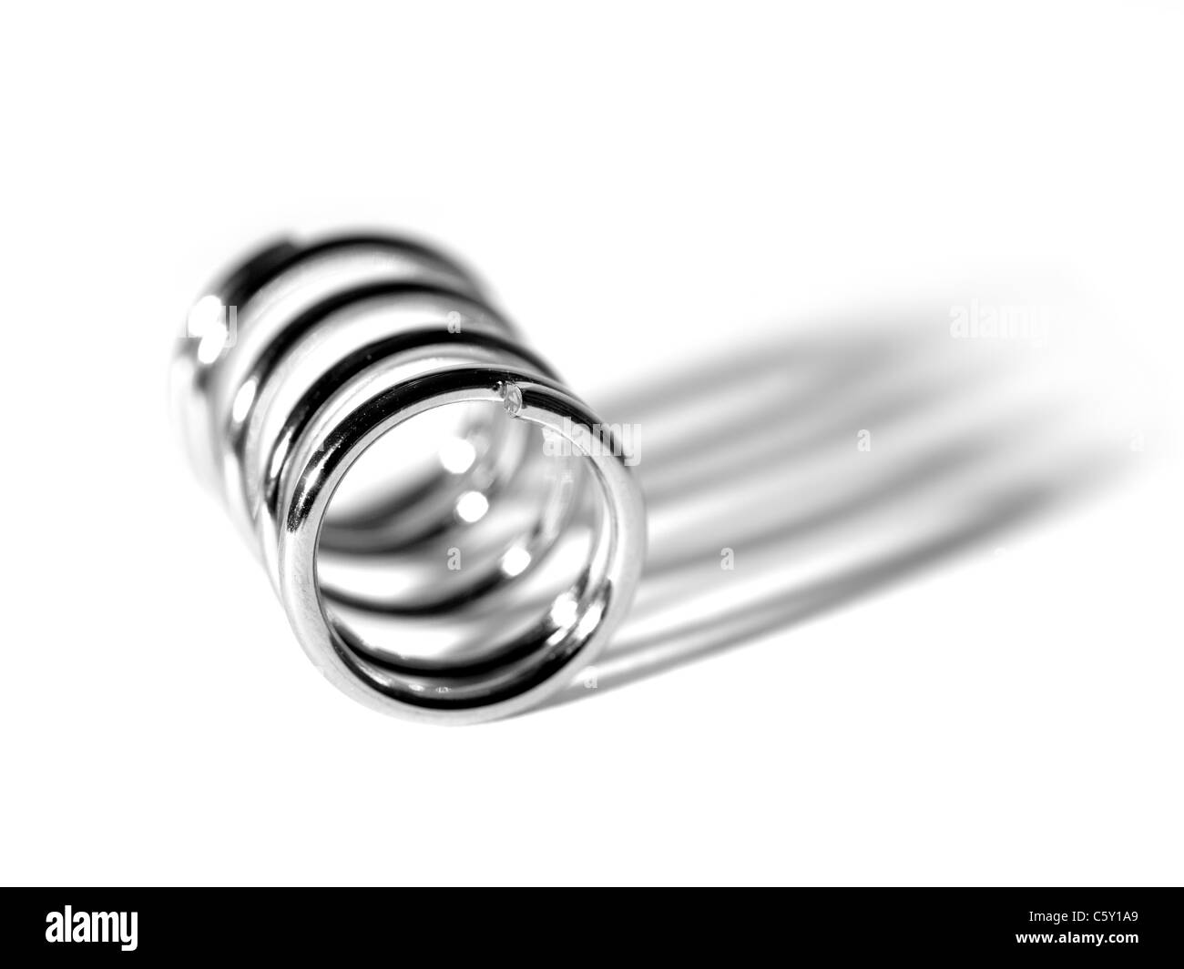 A spring isolated against a white background Stock Photo - Alamy