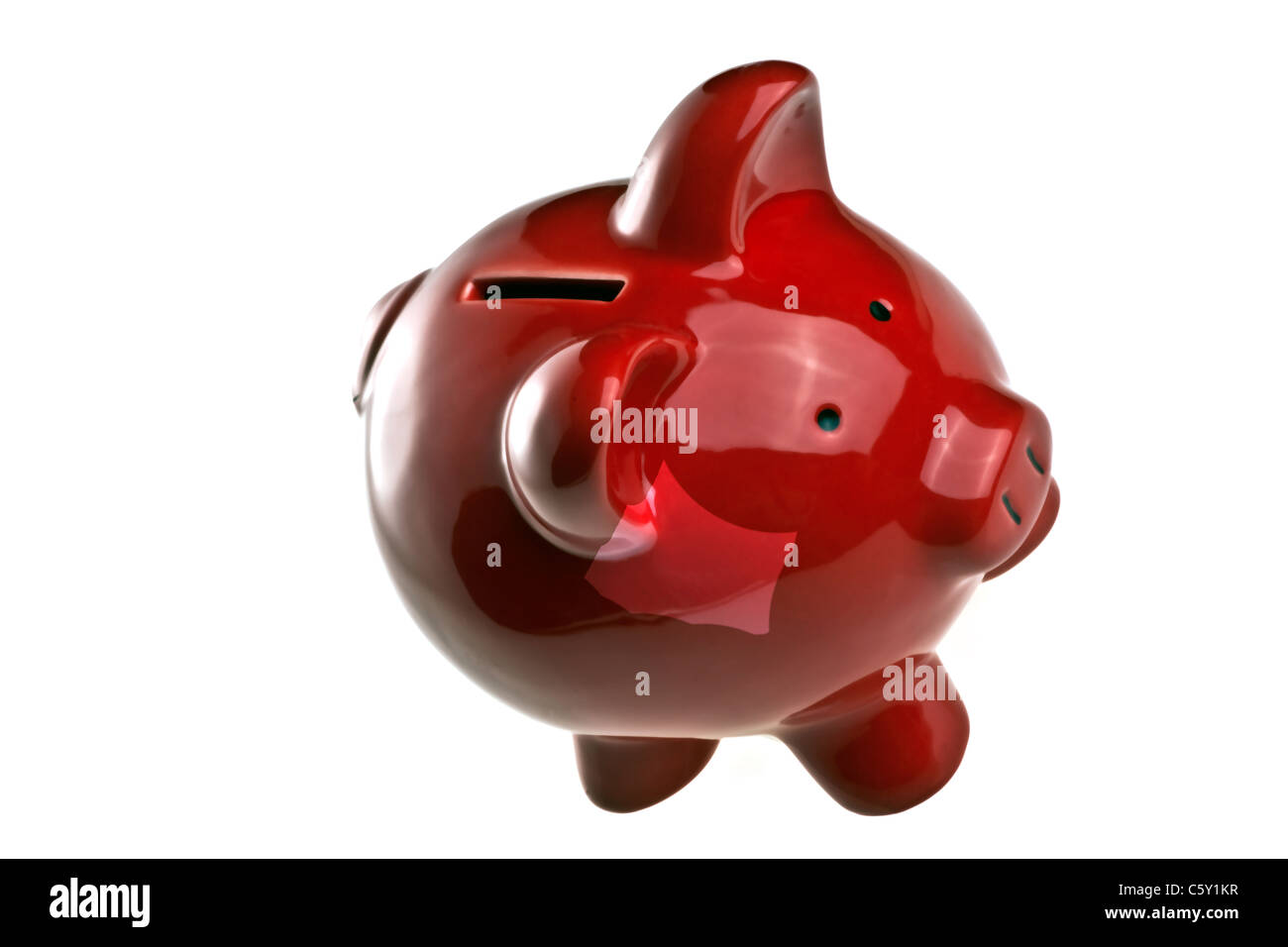 Red piggy bank isolated on white background Stock Photo - Alamy