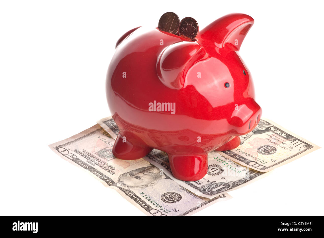 Red piggy bank isolated on white background Stock Photo - Alamy