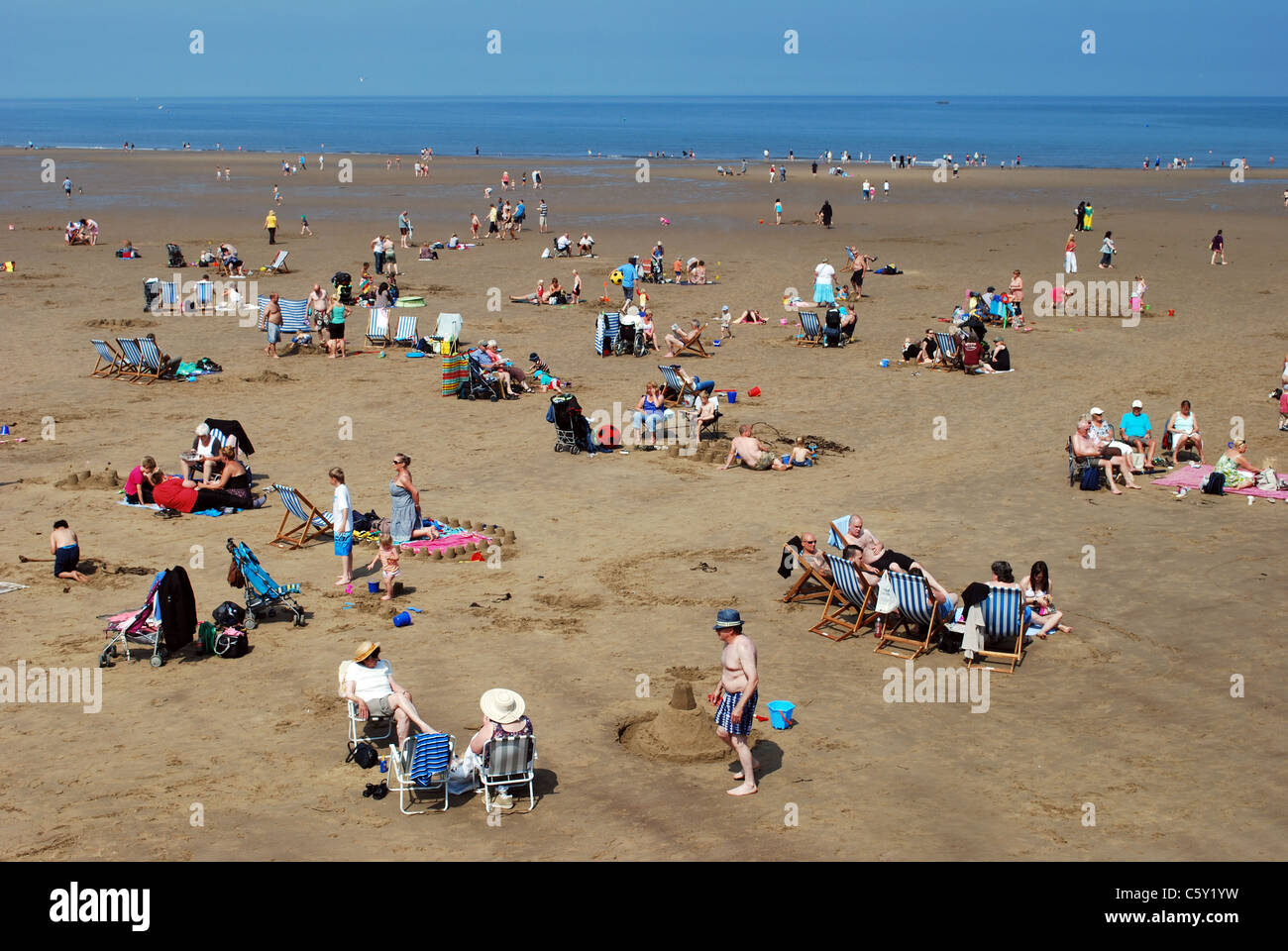 Crowds of people on the beach, at the seaside Stock Photo - Alamy