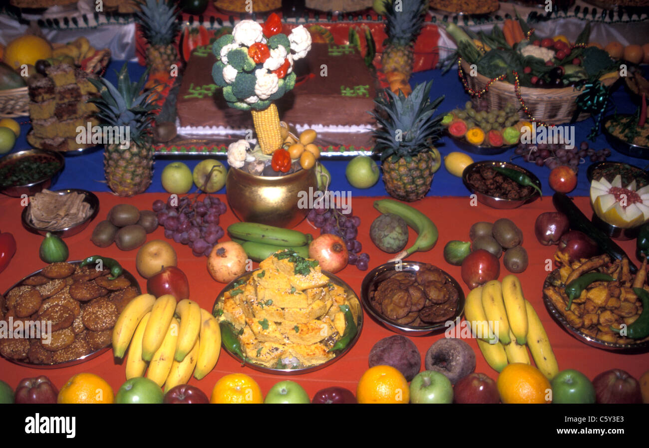 Fruits and sweetmeats placed on a Hindu temple altar for New Year ...