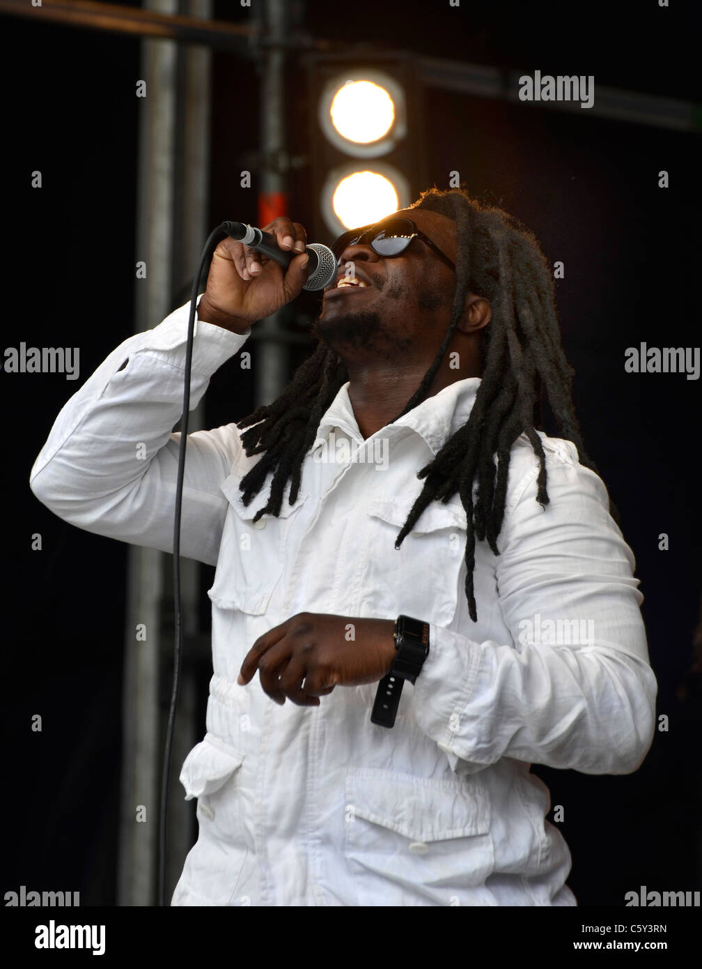 Yaw Boateg, Lead singer from the reggae band Zoh Zoh playing in concert ...