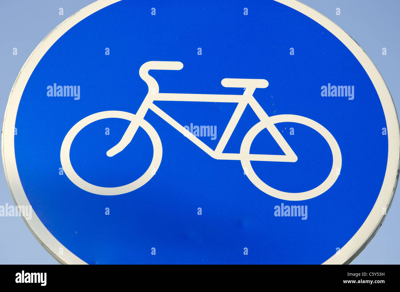 White bicycle sign in blue background. Road sign bicycle path Stock ...