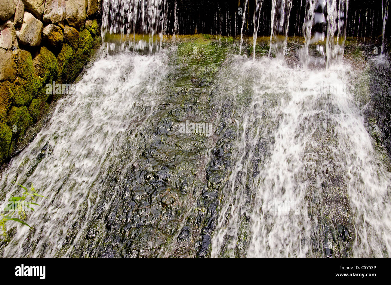 Water falling and flowing. Nice waterfall and old stones view Stock ...
