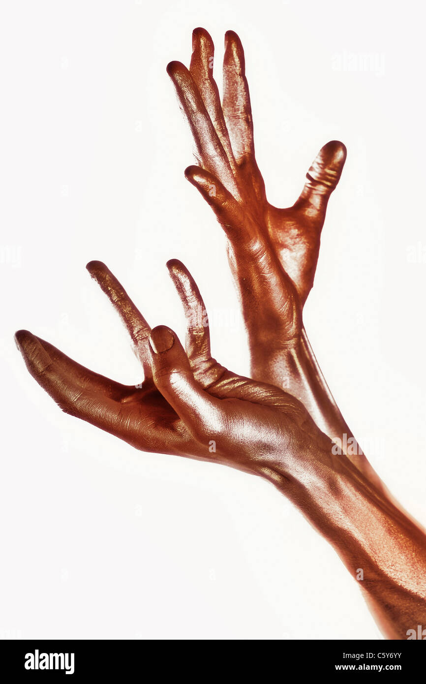 beautiful men metal hands with long fingers on white background Stock ...