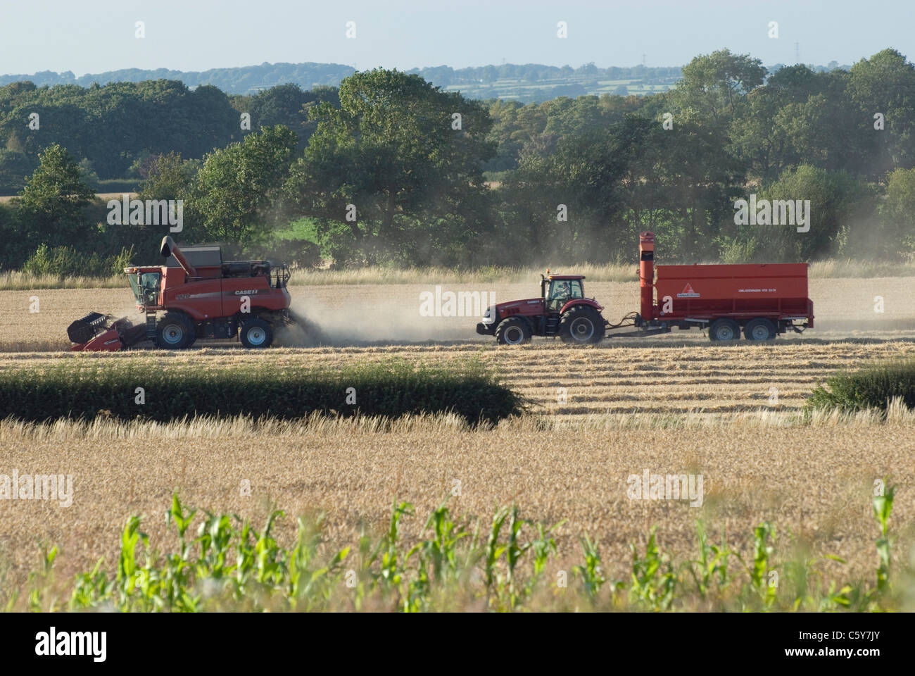 Tractor harvester working together hi-res stock photography and images ...