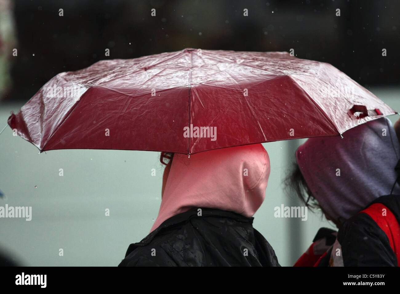 Two people umbrella landscape hi-res stock photography and images - Alamy