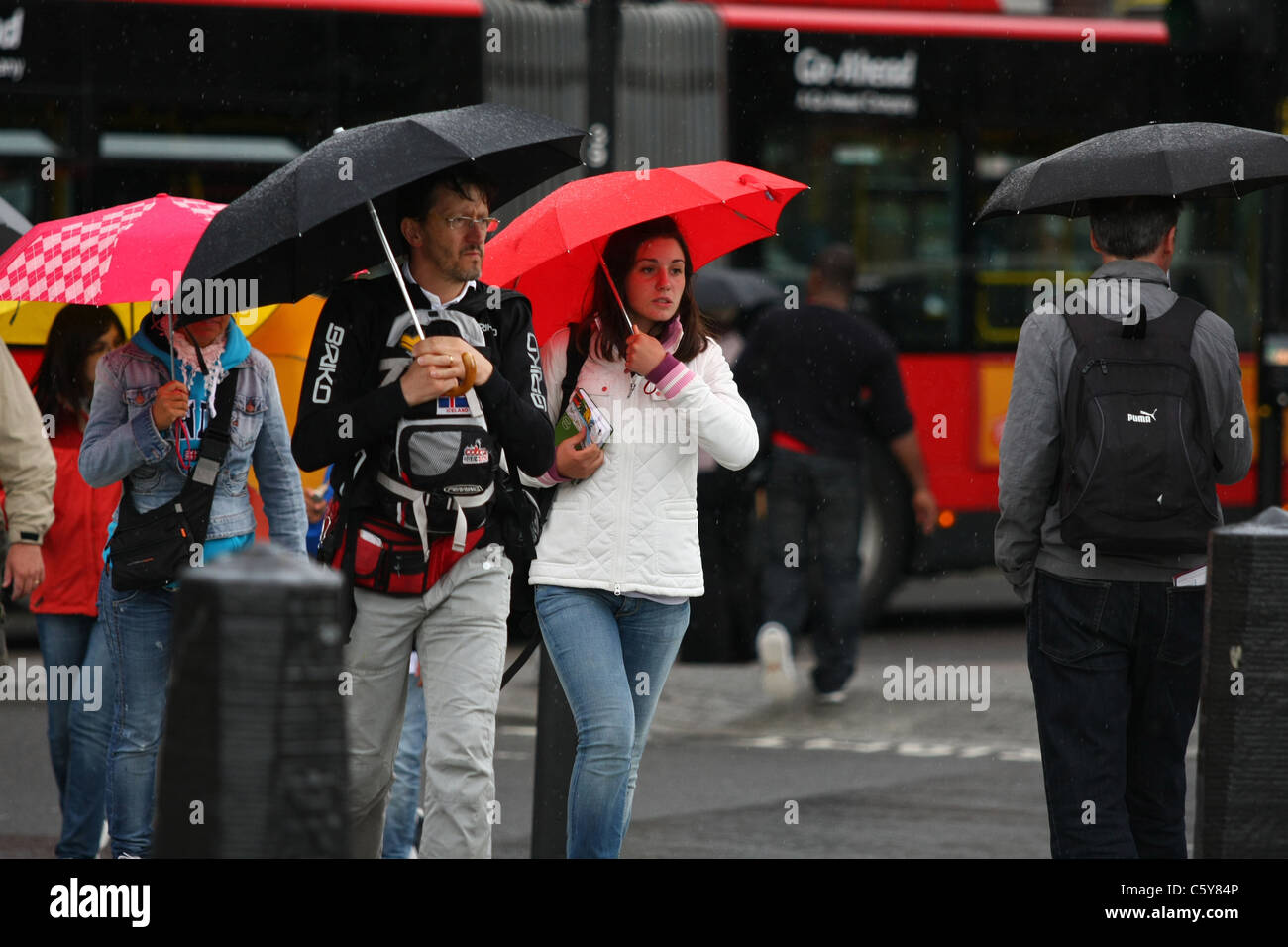 Woman umbrellas protect hi-res stock photography and images - Alamy
