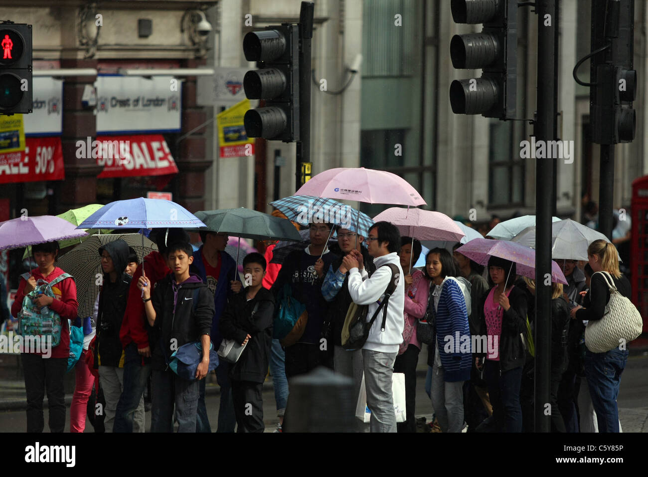 Male sheltering from the rain hi-res stock photography and images - Alamy