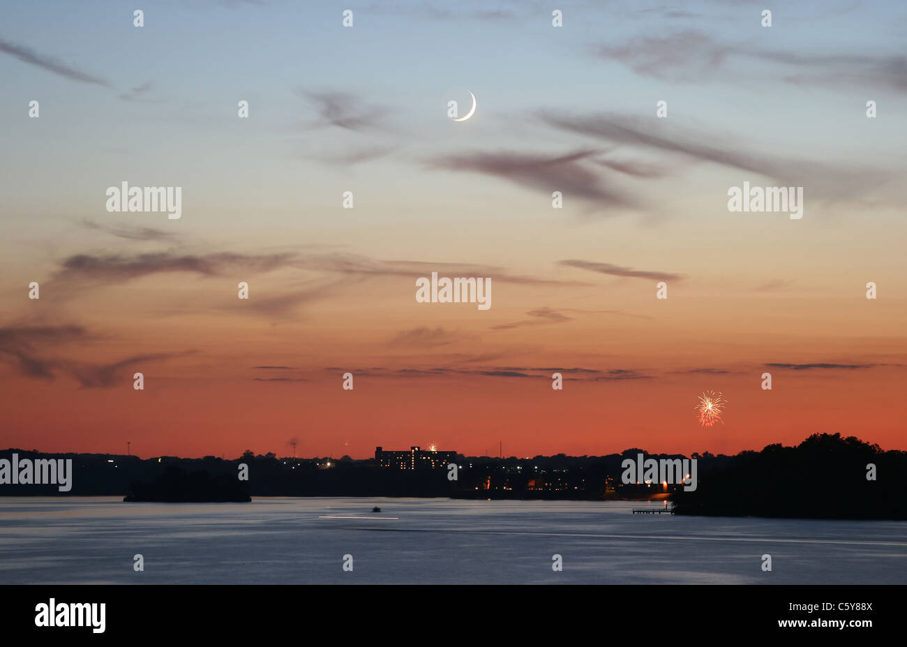 Crescent Moon over Ford Lake on the 4th of July Stock Photo - Alamy