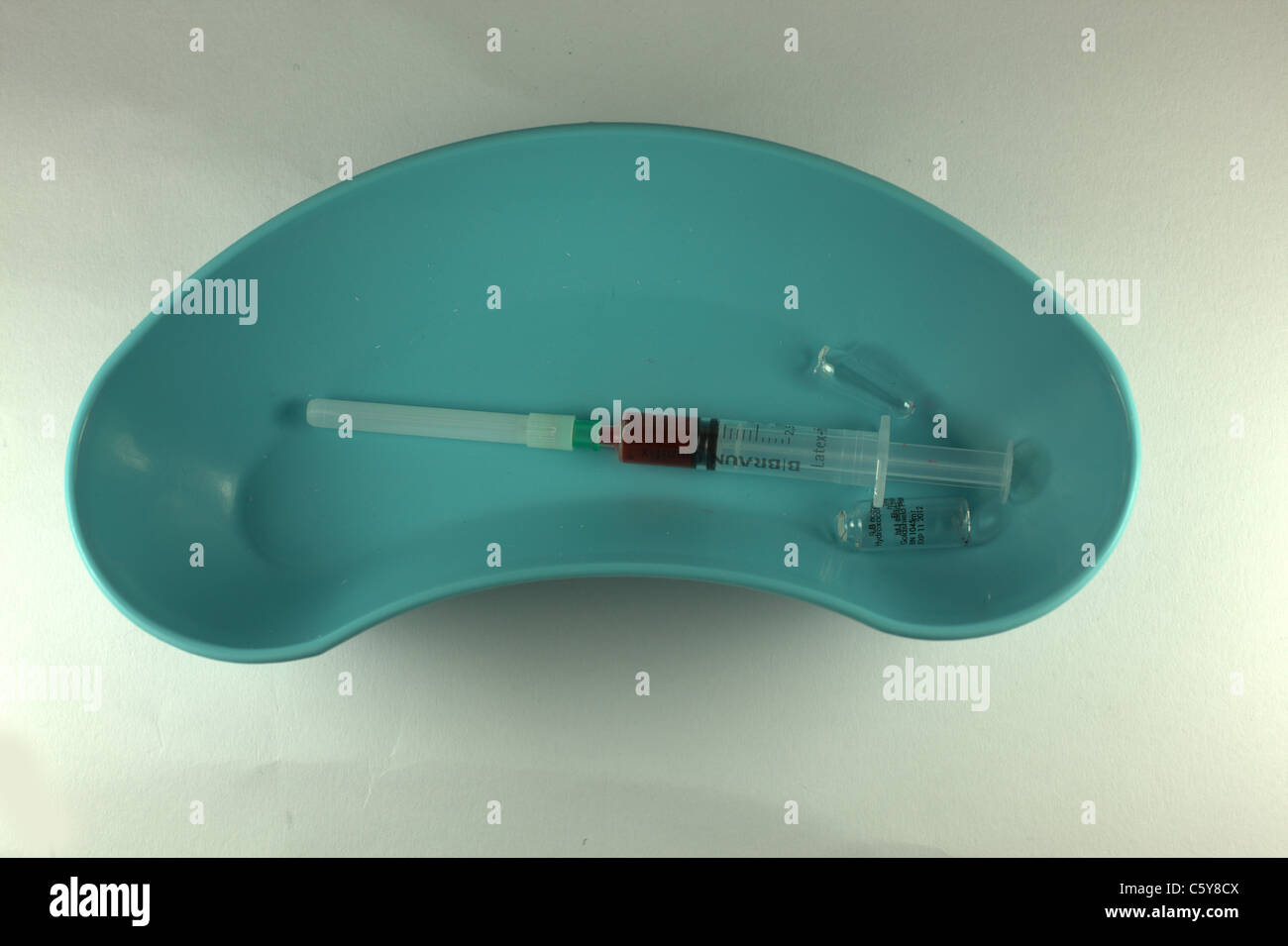 Blood sample in syringe awaiting hi-res stock photography and images ...