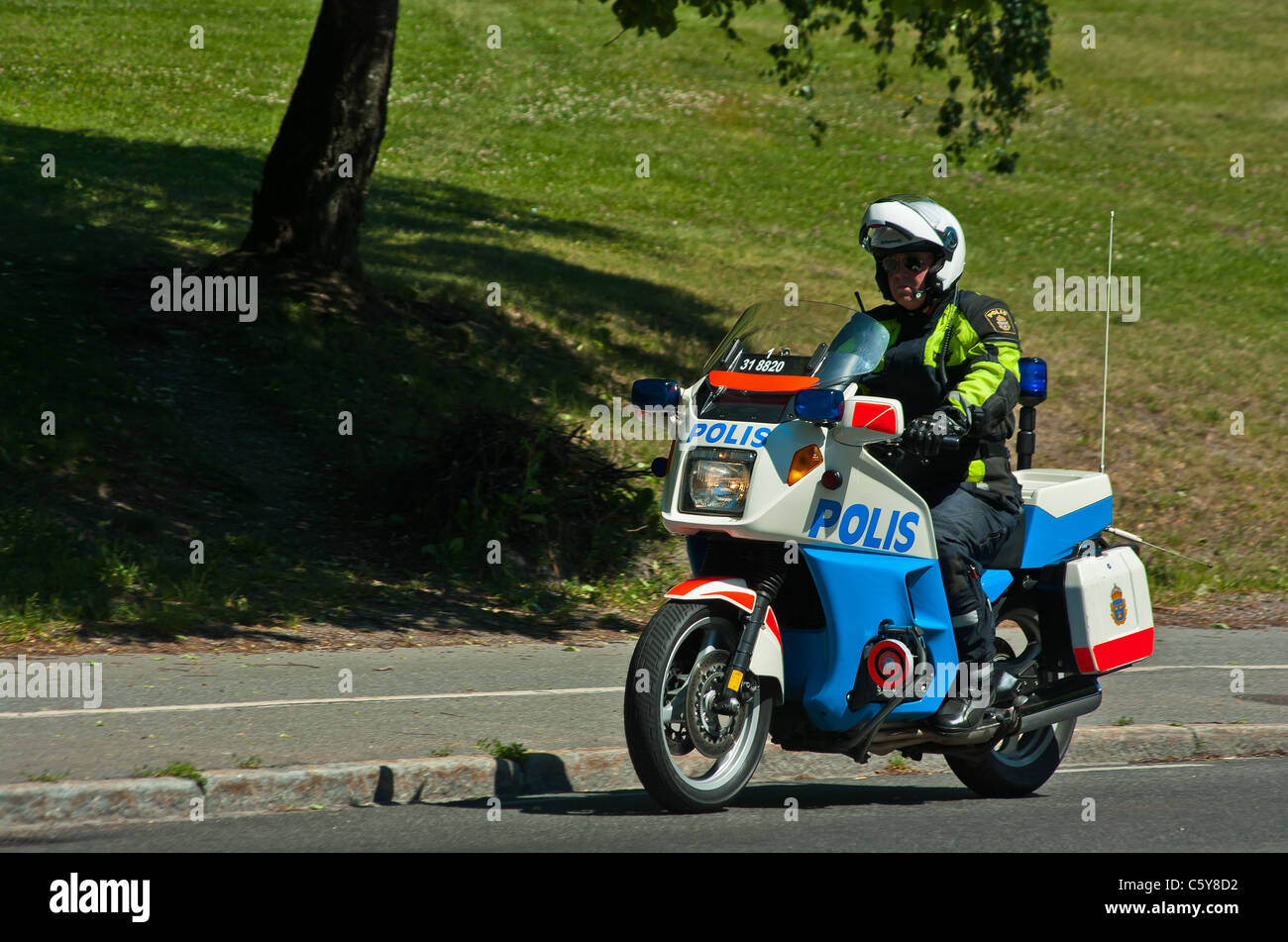 A police driving the motorcycle Stock Photo - Alamy