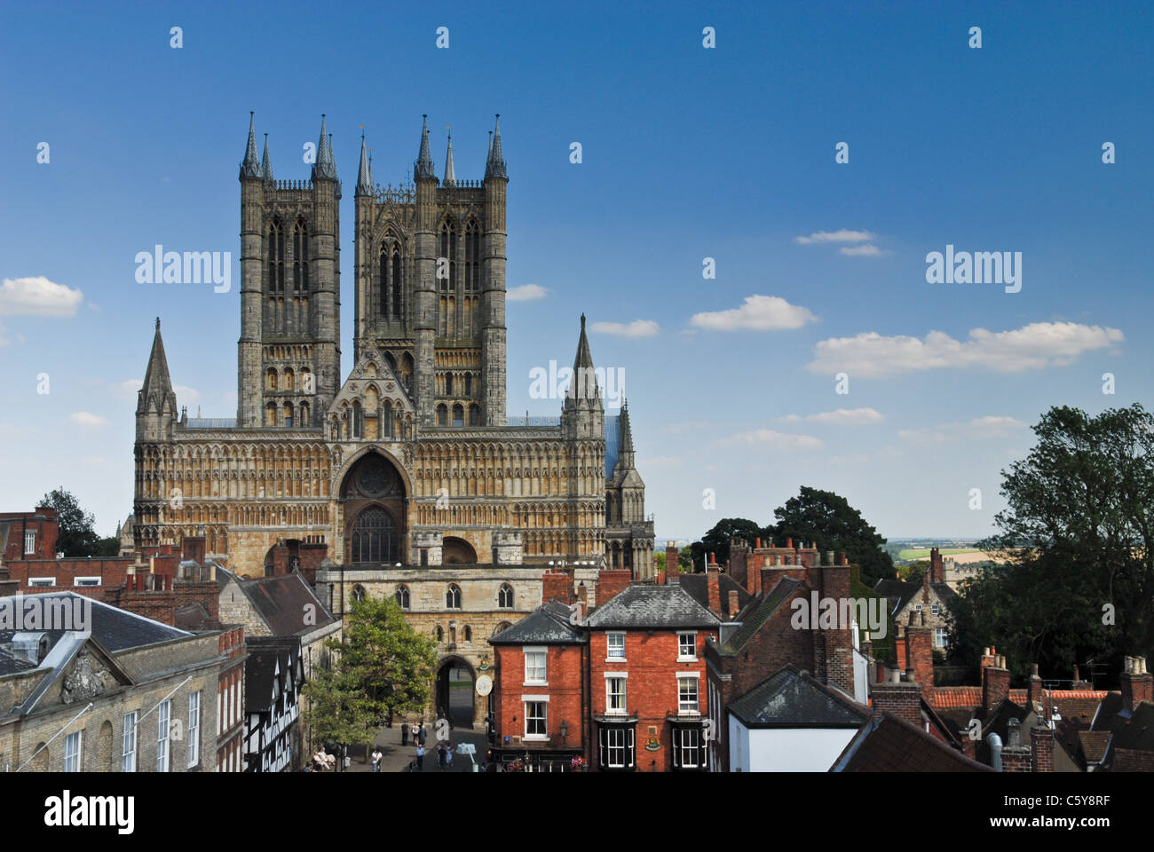 The magnificent Lincoln Cathedral and surrounding Castle Hill seen from ...